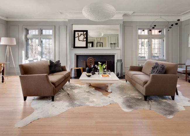 16 Photos Proving Why You Need a Cowhide Rug in Your Living Space ...
