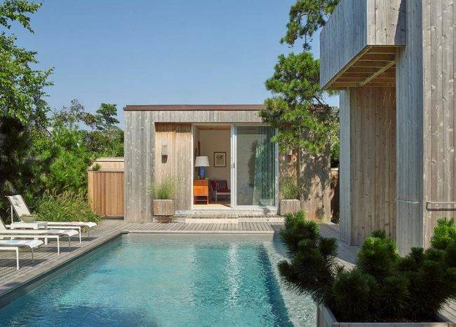 41 Pool House Designs To Complete Your Dream Backyard Retreat